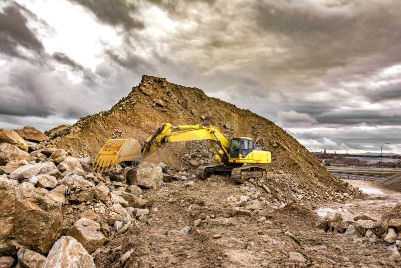 Heavy Machinery Moving Stone and Rock in an Open Mine Stock Photo ...