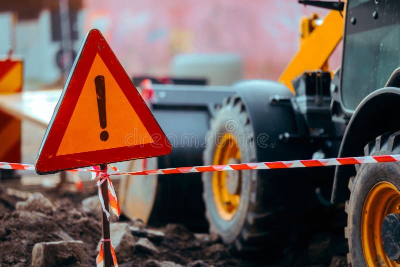 Excavator on Construction Site Marked by Warning Sign Stock Photo ...
