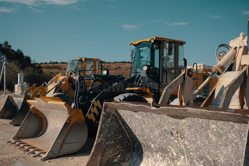 Heavy machinery in quarry stock photo. Image of engineering - 159270224