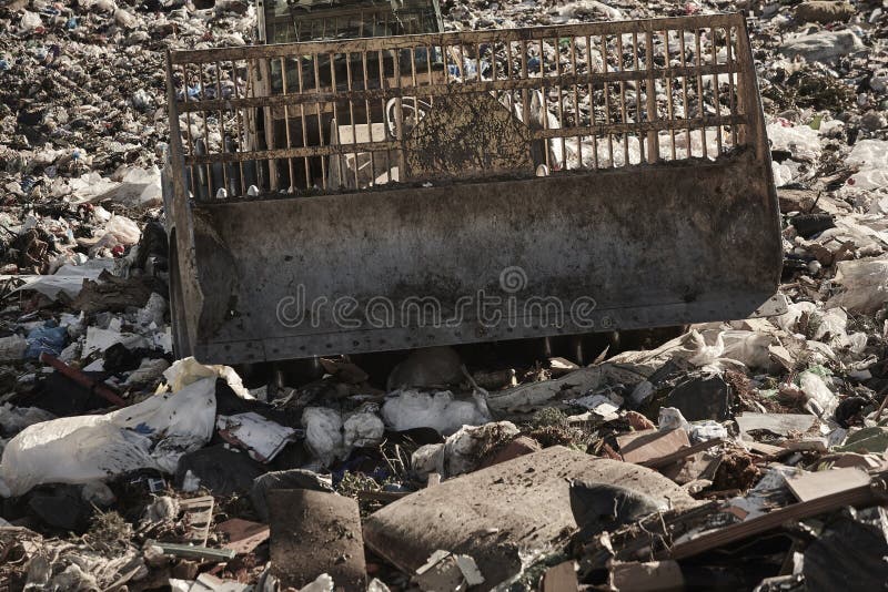 Heavy Machinery Shredding Garbage in an Open Air Landfill. Pullution ...