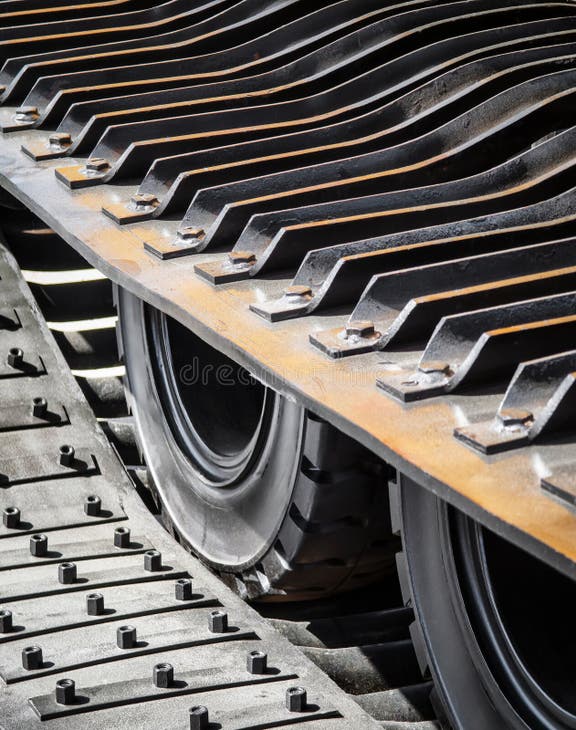 Heavy Machinery Tracks and Wheels in Motion during Construction Work at ...