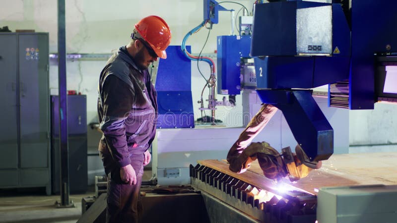 Heavy Machinery Welding the Metal in the Manufacturing Factory the Work ...