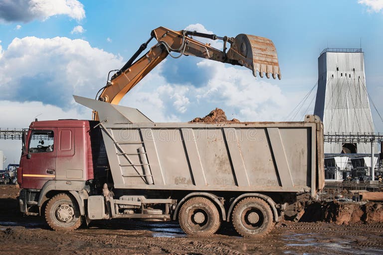 Heavy Machinery at Work on a Construction Site during a Clear Day ...