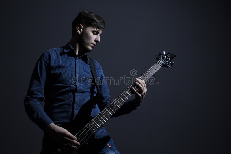 Heavy metal musician stock image. Image of bass, adult - 66510343