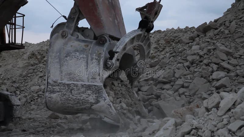 Mining Dump Trucks in Large Granite Open Pit Mine. Loaded Trucks Rides ...