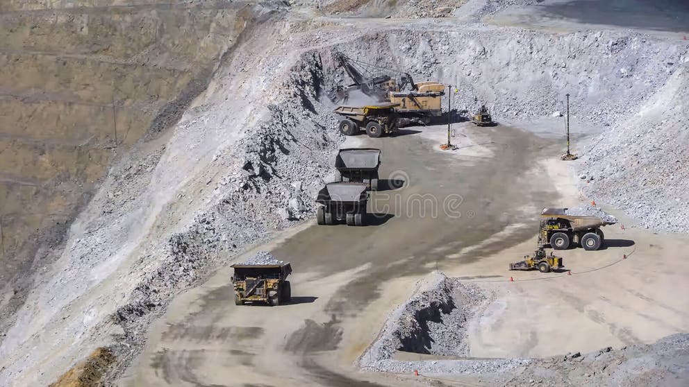 Heavy Mining Machinery Extracting Minerals in an Open Pit Mine Stock ...
