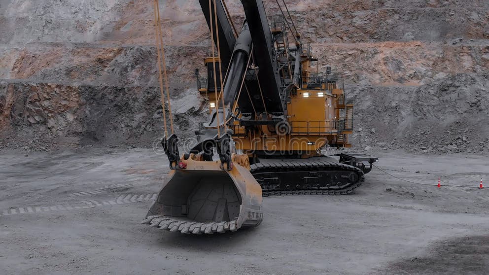 Heavy Mining Machinery Extracting Minerals in an Open Pit Mine Stock ...