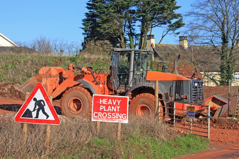 Heavy Plant Crossing stock image. Image of site, grader - 71988307