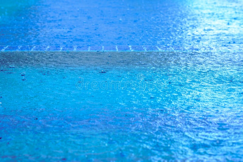 Heavy Rain in the Blue Swimming Pool Stock Photo - Image of nature ...