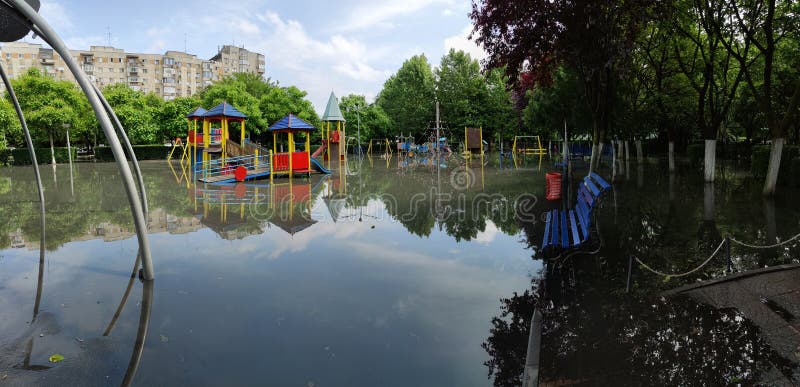 Flooded Playground in the Park Stock Photo - Image of bench, drainage ...