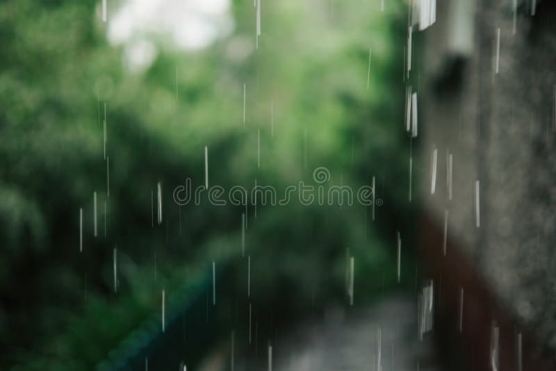 Heavy Rain Drops Falling on City Street Stock Photo - Image of spray ...