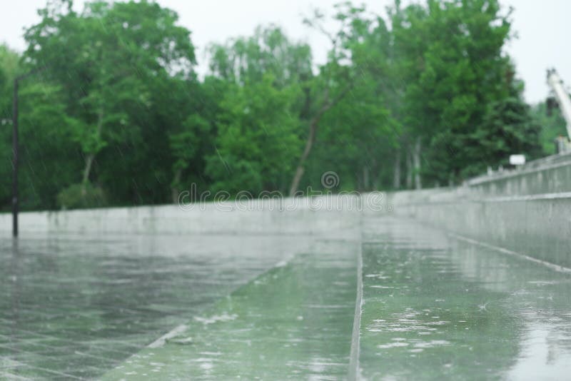 Heavy Rain Falling Down on City Street, Stock Image - Image of ...
