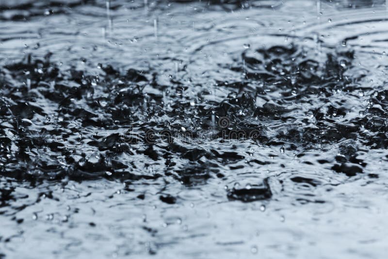 Heavy Rain Falling Down into Puddle Stock Image - Image of falling ...
