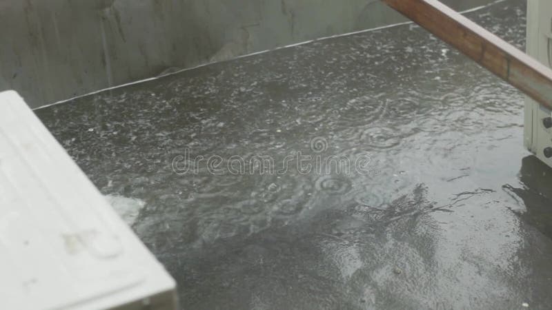 Heavy Rain Formed a Stream on the Roof. Raindrops Fall on the Roof and ...