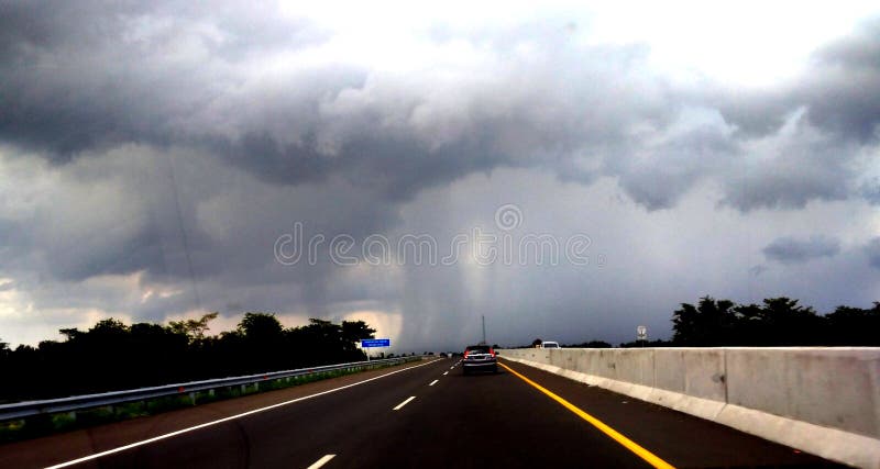 Heavy rain on the highway stock photo. Image of road - 263297778