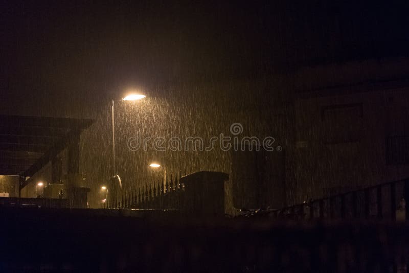 Heavy Rain in the Light of a Lamppost at Night Stock Photo - Image of ...