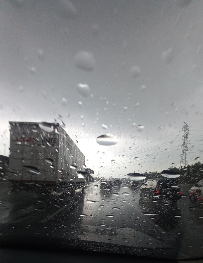 Heavy Rain during a Long Journey Stock Photo - Image of journey, dark ...