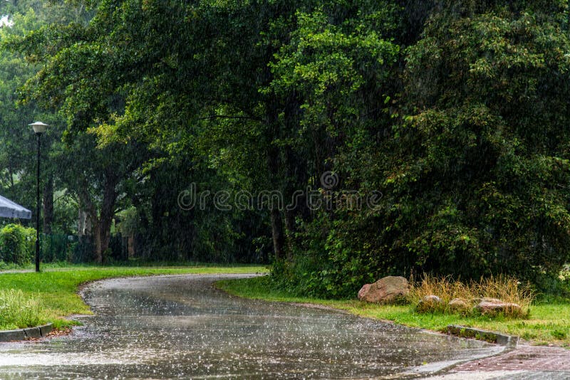 Heavy rain outdoors stock image. Image of estate, water - 346987747