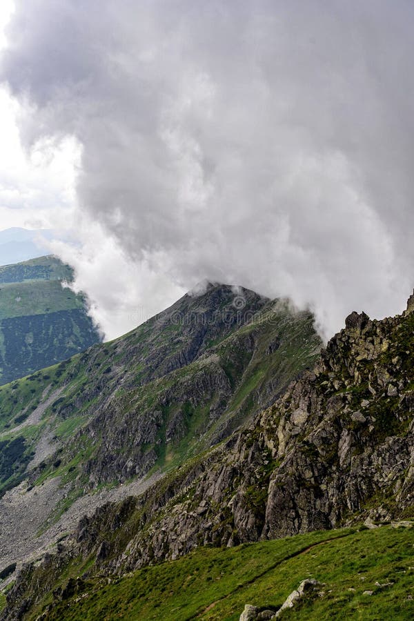 Heavy rain over mountains. stock photo. Image of dark - 136057220