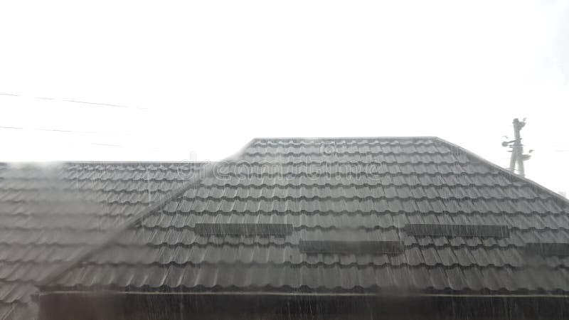 Heavy Rain, View from the Window To the Roof and Sky Stock Photo ...