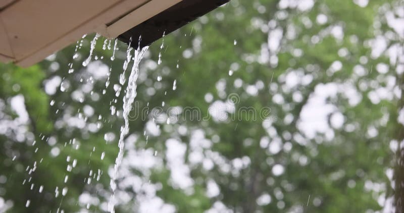 During Heavy Rain, Water Comes from the Over Gutters Stock Video ...