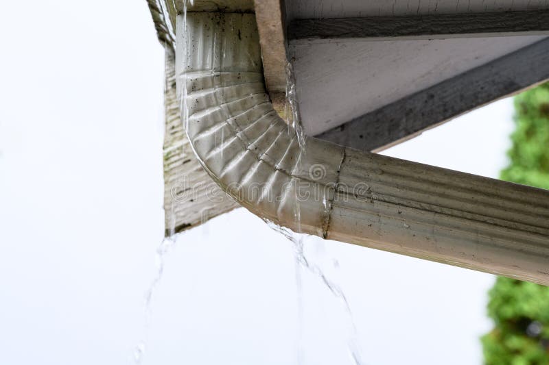 Heavy Rainfall Overflowing Roof Gutter and Not Going Down the Downspout ...