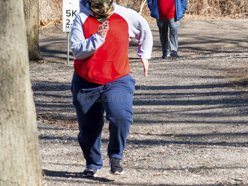 Heavy Runner Running Uphill on Trail in Park Stock Image - Image of ...