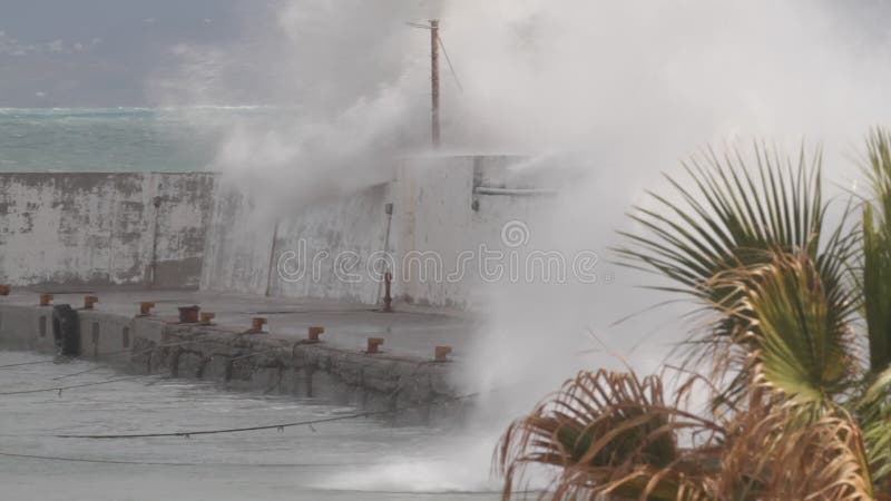 Heavy Sea, Waves Breaking Over a Harbor Wall during a Storm in the ...