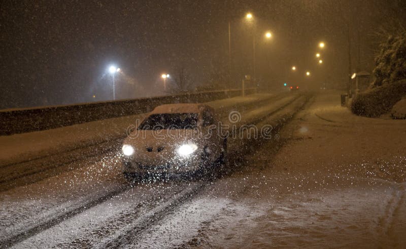 Heavy Snow Fall with Passing Traffic Stock Image - Image of traffic ...