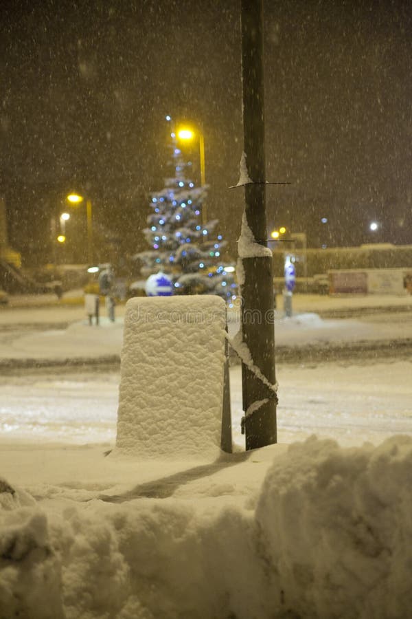 Heavy snow fall on a sign stock image. Image of busy - 21825763