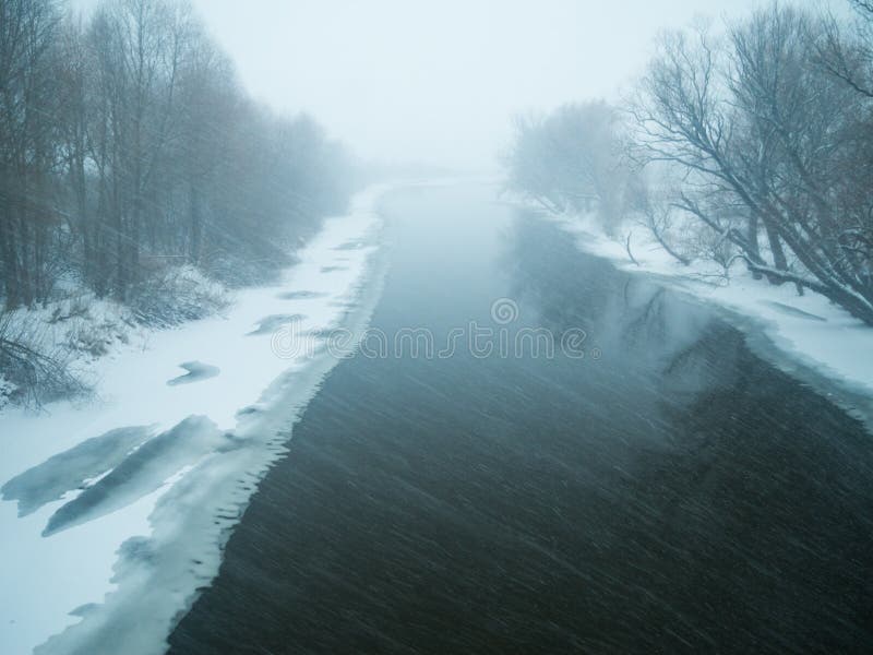 Heavy Snowfall on the River Stock Photo - Image of nature, heavy: 102061026