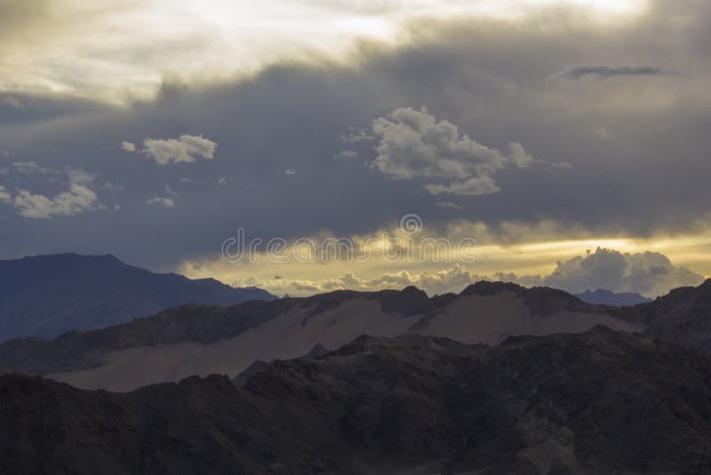 A Heavy Sunset Sky Over the Desert Mountain Ranges Stock Image - Image ...