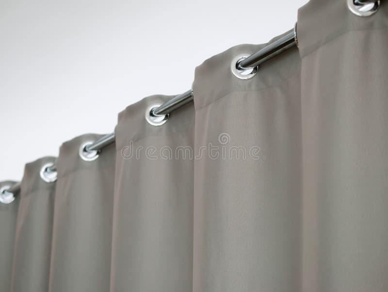 Heavy Thick Gray Curtain with Grommets on the Stainless Tube of the ...