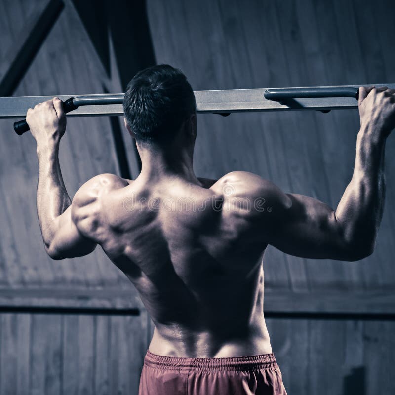 Heavy training in gym stock photo. Image of chinup, biceps - 200306192