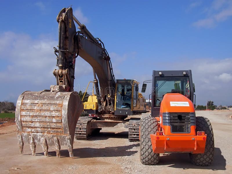 Construction Site Vehicles stock photo. Image of construct - 4011796