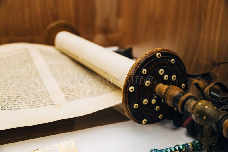 The Hebrew Handwritten Torah Scroll, on a Synagogue Alter Stock Photo ...