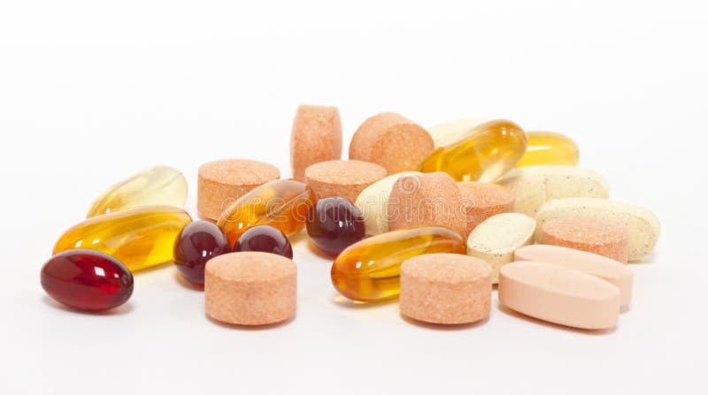 Voedingssupplementen in Capsules En Tabletten, Op Houten Achtergrond ...