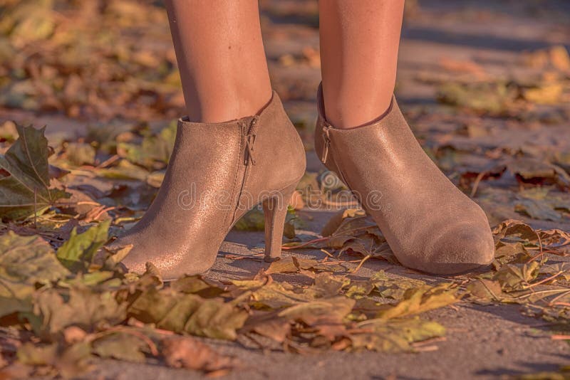 Heel of Woman on the Autumn Leaves Stock Photo - Image of fall, walk ...