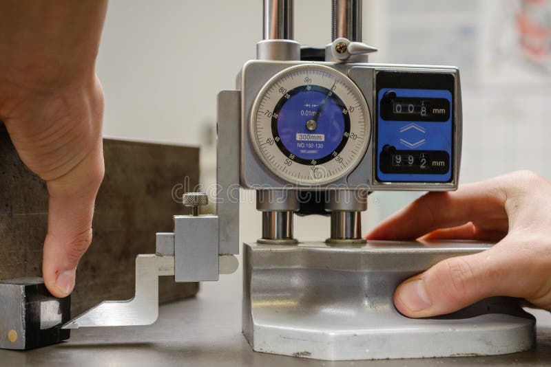 Height Measuring Device for Metal Processing Stock Photo - Image of ...