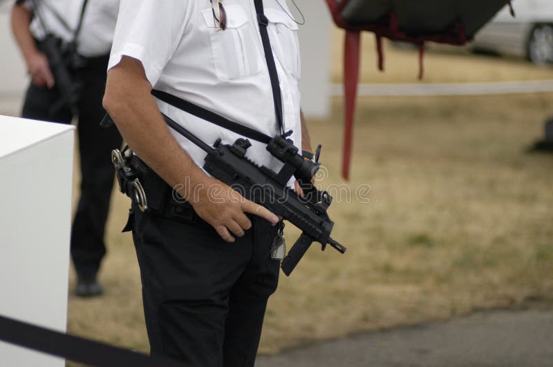 Security Guard with Machine Gun Stock Image - Image of america, firearm ...