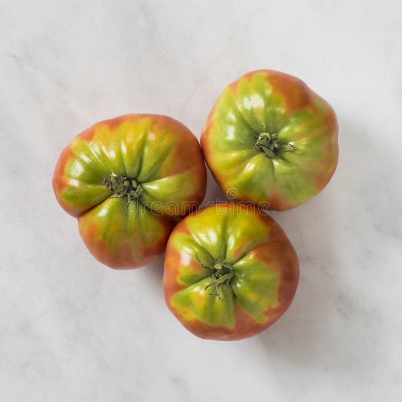Heirloom Beefsteak Tomatoes on Marble Table Stock Image - Image of ...