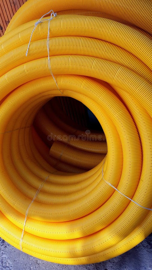 Huge Coil of Bright Yellow PVC Plastic Hose Stock Photo - Image of hose ...