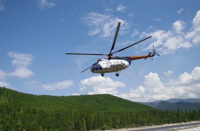 Helicopter stock photo. Image of river, mountains, water - 25591898