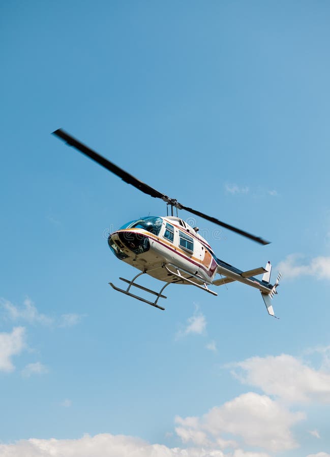 Red Light Helicopter in Flight Stock Photo - Image of cabin ...