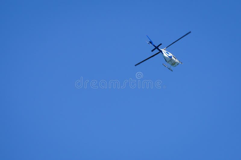 Helicopter from below stock photo. Image of hover, horizon - 126319676