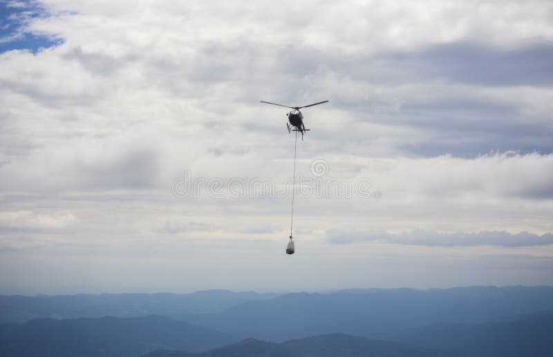 Helicopter carry cargo stock photo. Image of rope, technology - 101493746