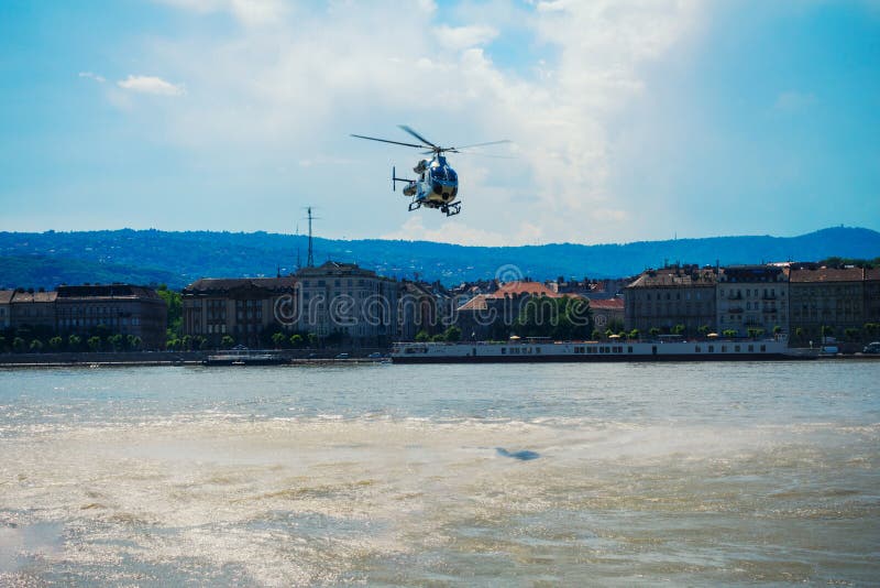 Helicopter is Circling Over the Water in Budapest Stock Image - Image ...