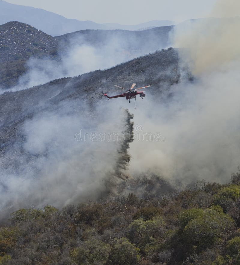 Helicopter Drops Retardent on Fire Editorial Photography - Image of ...