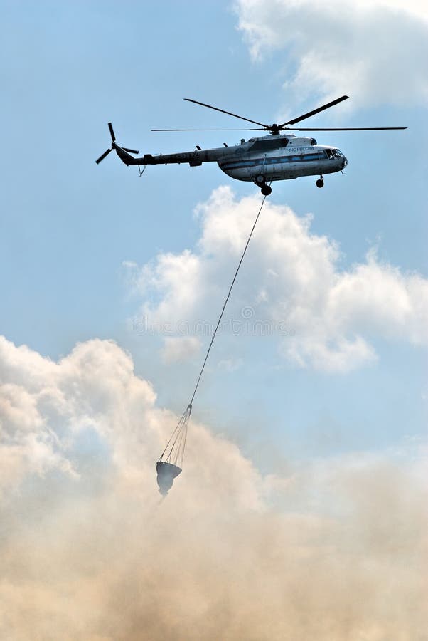 Helicopter over explosion stock image. Image of flying - 12816131