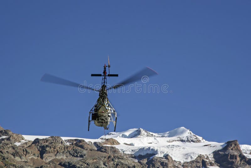 Helicopter Flight in the Mountains Stock Image - Image of alps ...
